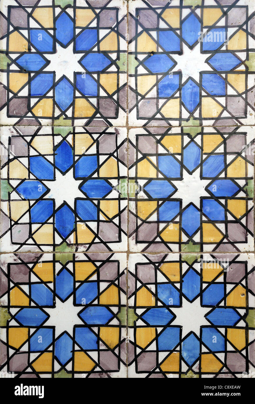 Blue and yellow painted tiles (azulejos) on the exterior walls at the ...