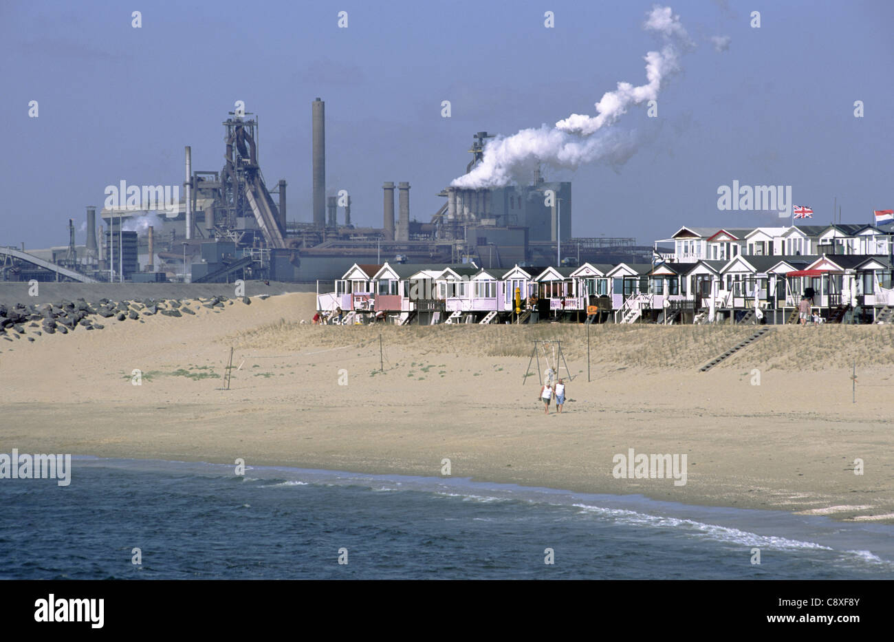 Beach Cabins With Steel Mills In The Background Ijmuiden Holland Beach Cabins With Steel Mills In The Background Ijmuiden Holland