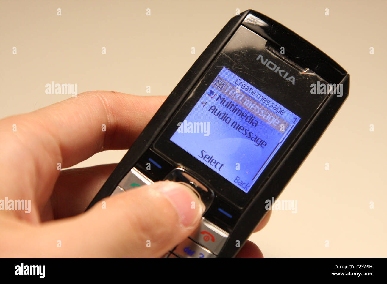 creating text message mobile phone Stock Photo - Alamy