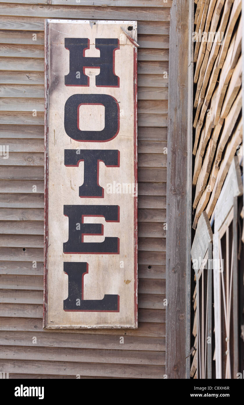 An old wooden hotel sign Stock Photo - Alamy