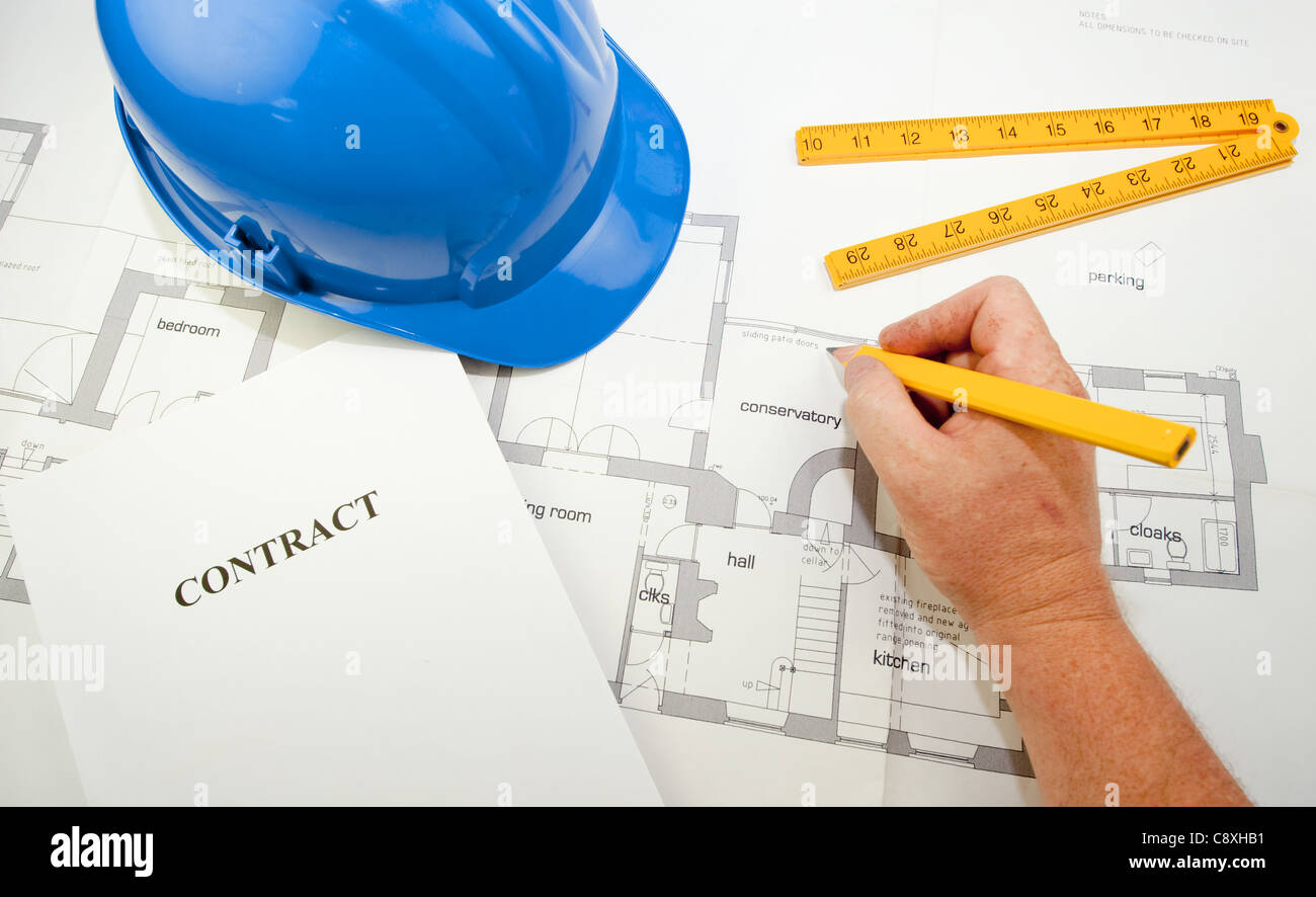 Construction contract and blueprints Stock Photo - Alamy