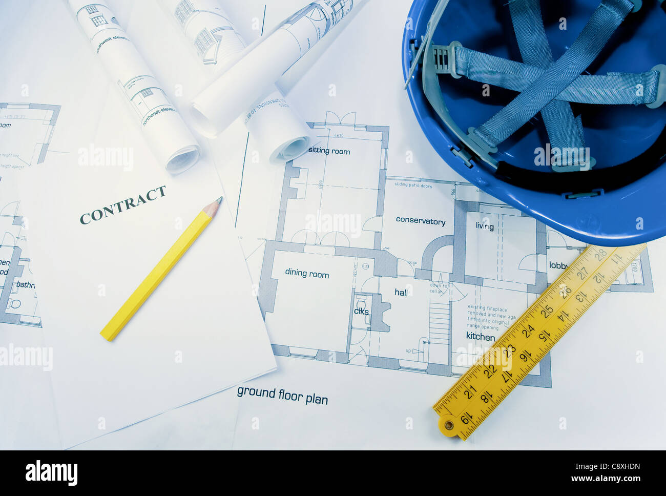 Construction contract and blueprints/plans Stock Photo - Alamy