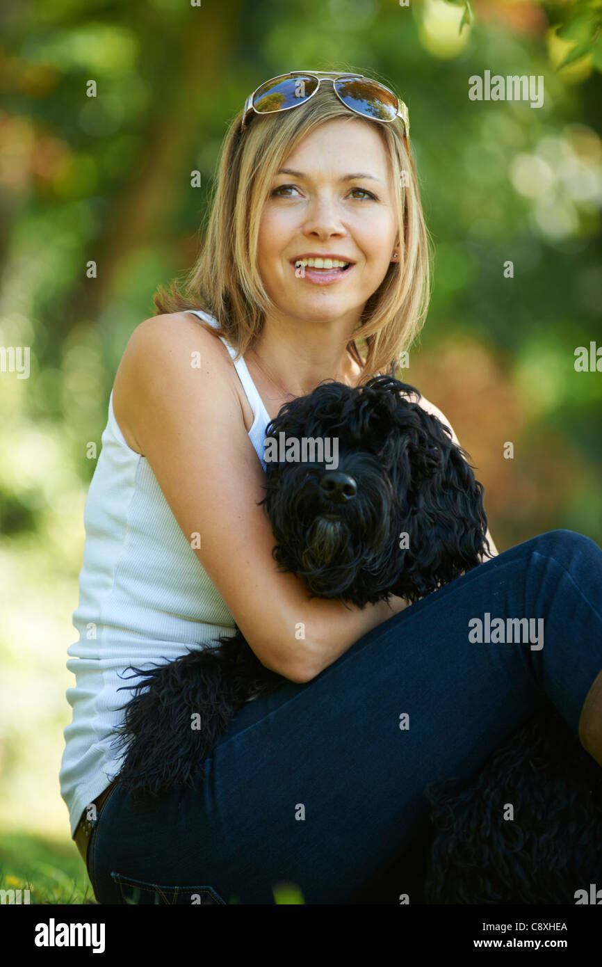 Loving woman dog cuddle hi-res stock photography and images - Alamy