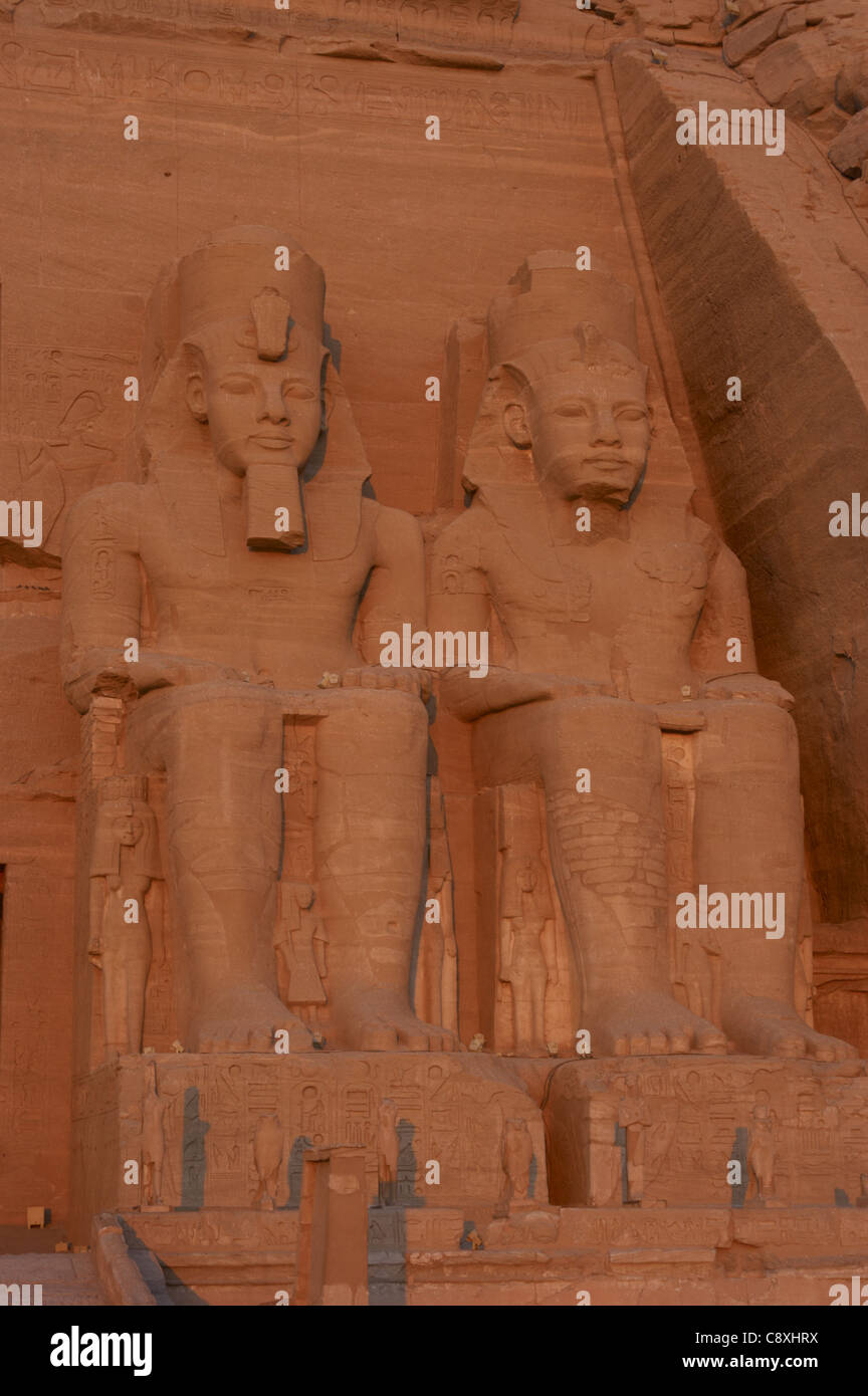 Egyptian art. Great Temple of Ramses II. Two colossal statues depicting ...