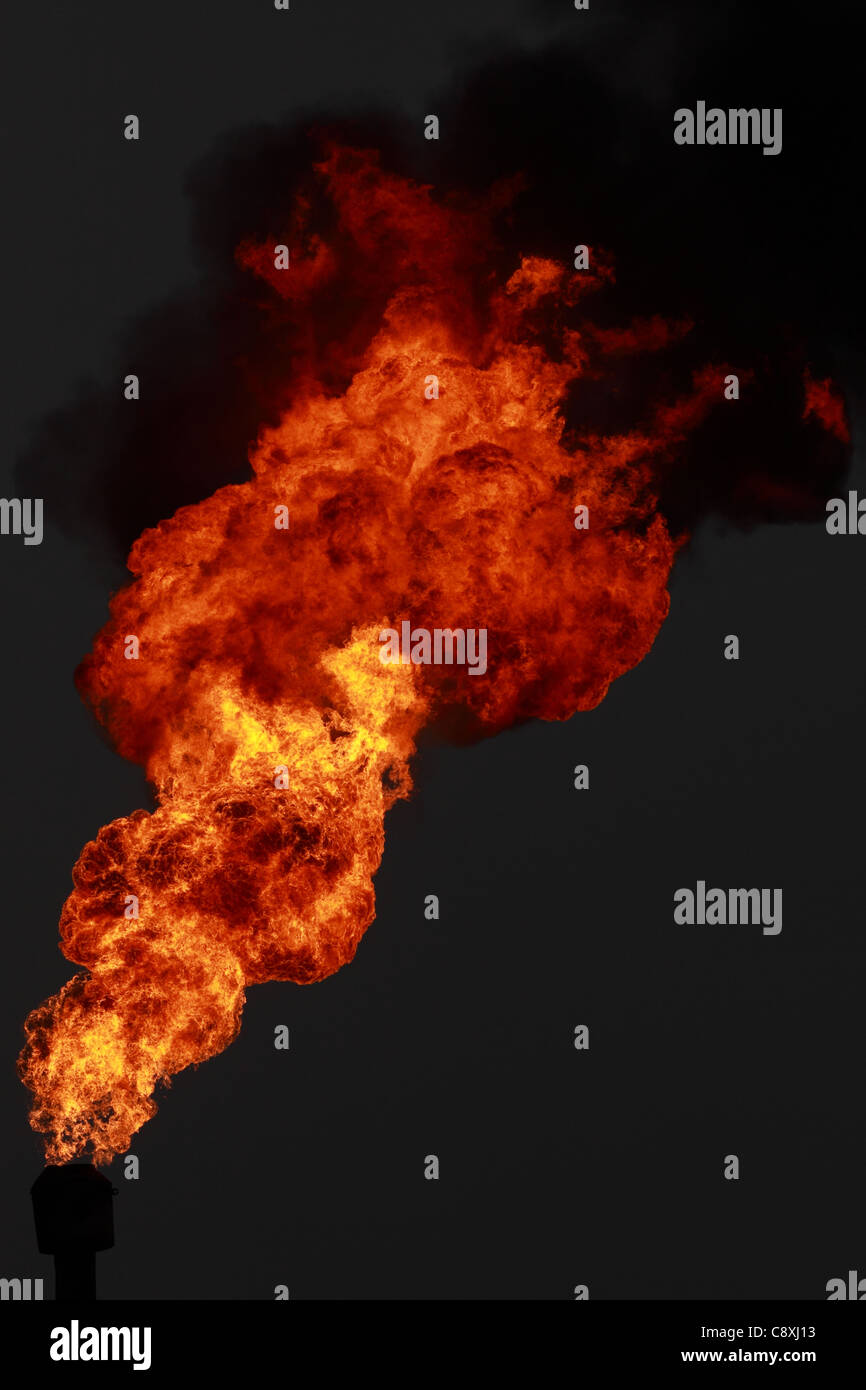 Flame from associated gas flaring in the atmosphere Stock Photo - Alamy