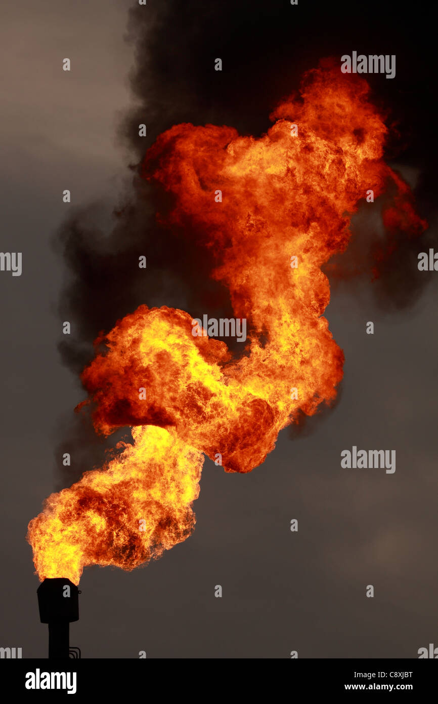 Flame from associated gas flaring in the atmosphere Stock Photo - Alamy