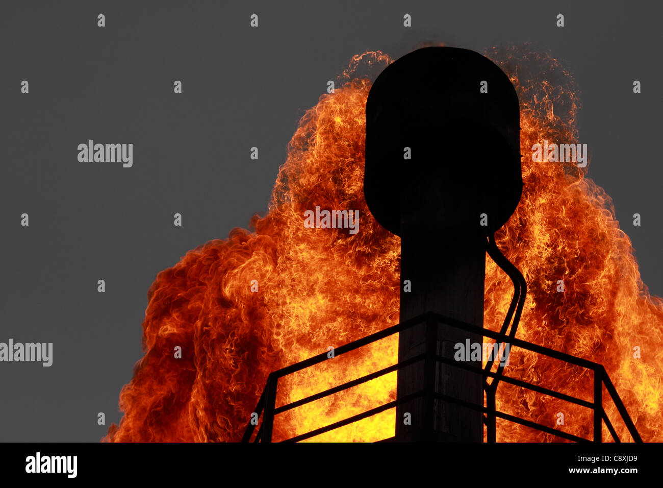 Flame from associated gas flaring in the atmosphere Stock Photo - Alamy