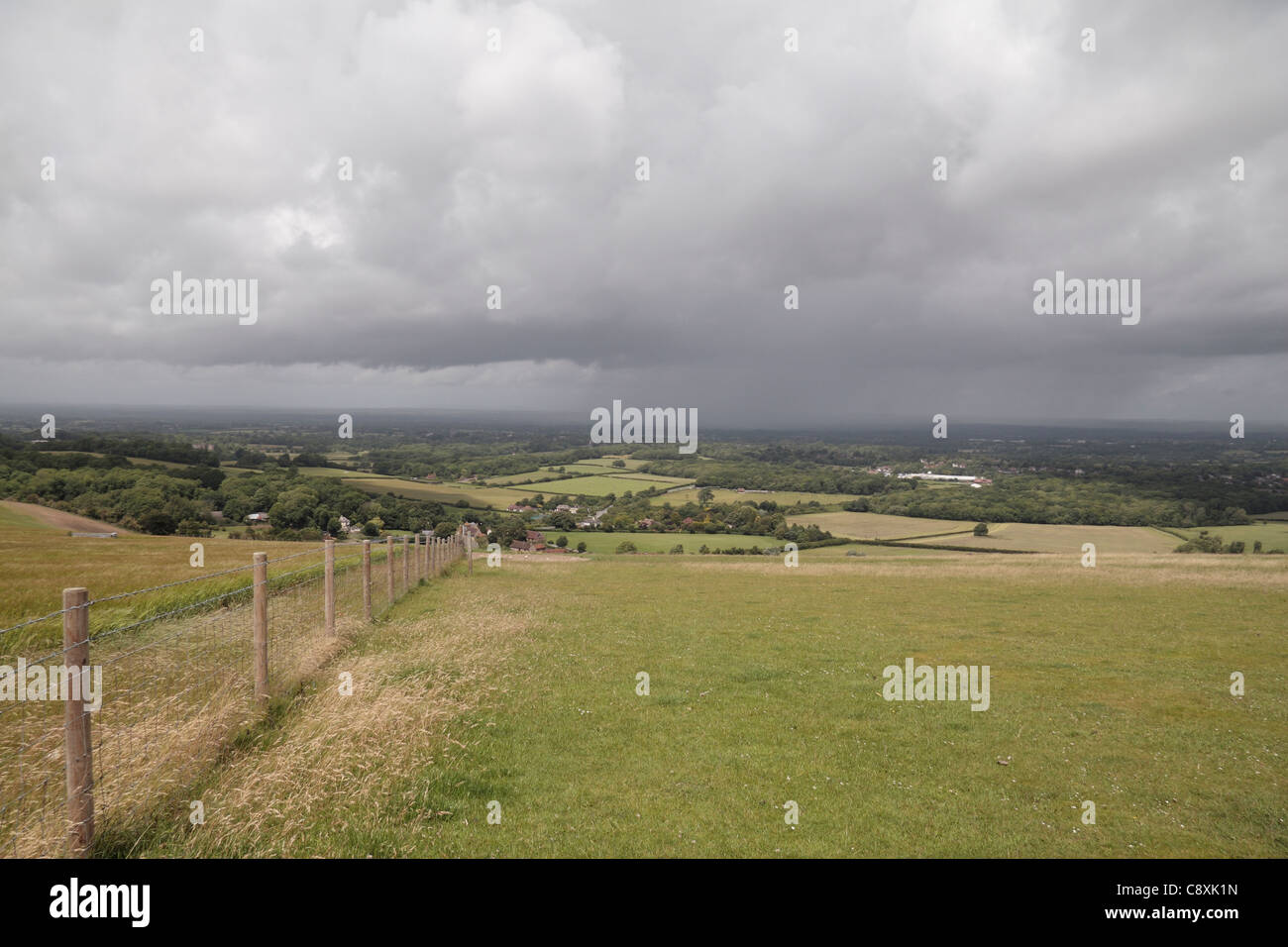 Rain storm moves across the English countryside on the South Downs near ...