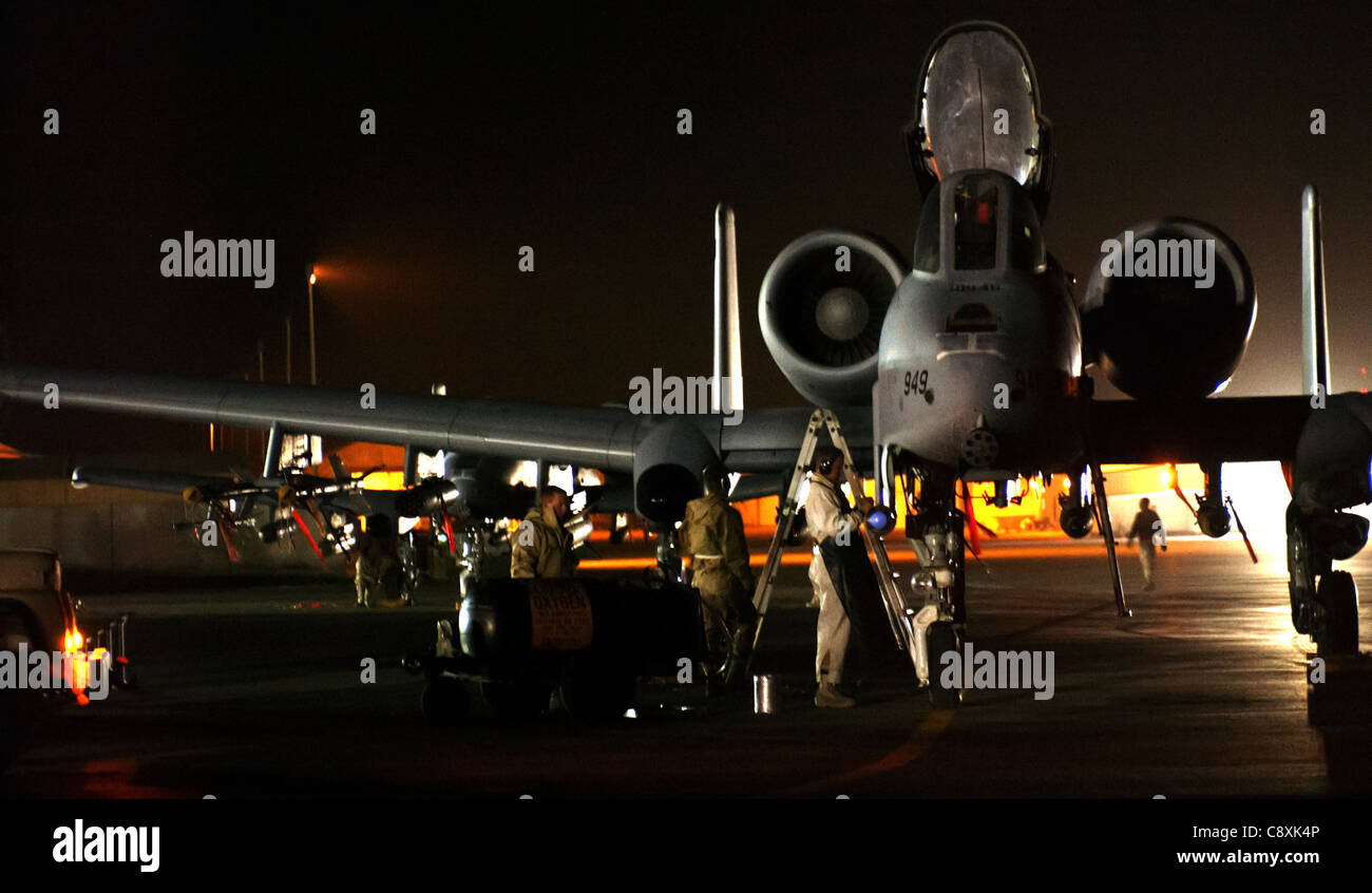 OPERATION IRAQI FREEDOM -- Maintenance troops work on an A-10 ...