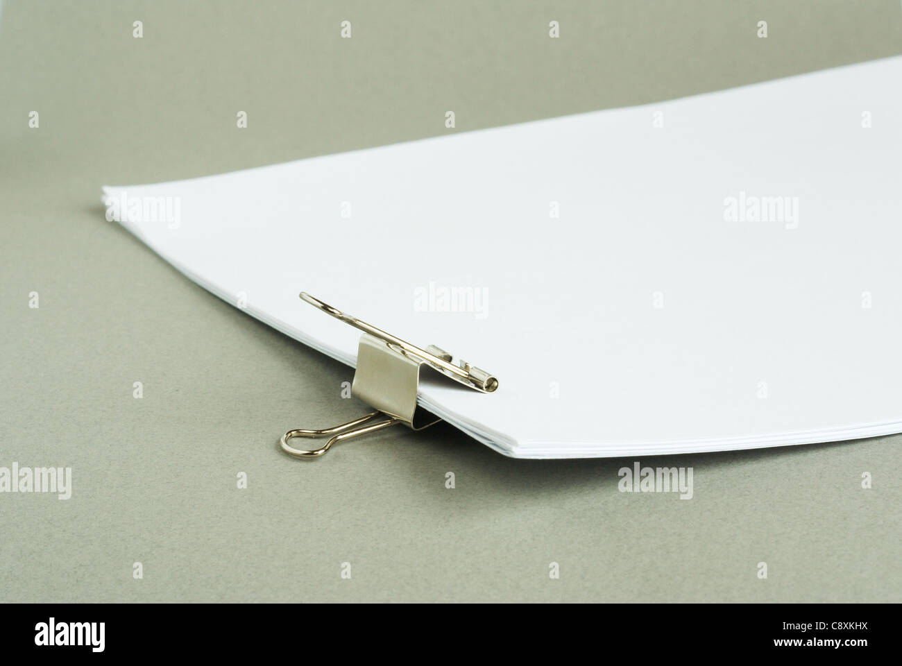 Chrome clamp for paper Stock Photo - Alamy