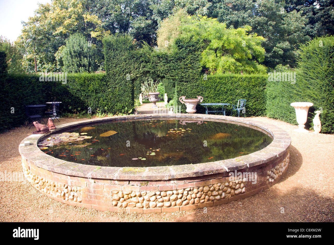 Victorian raised garden ornamental fish pond in courtyard, the Walled ...