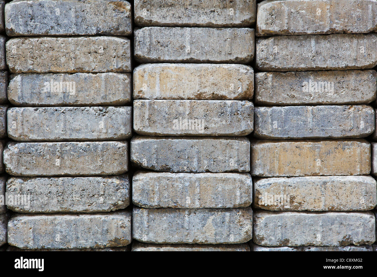 Blue gray concrete long bricks or pavers at a construction store Stock ...