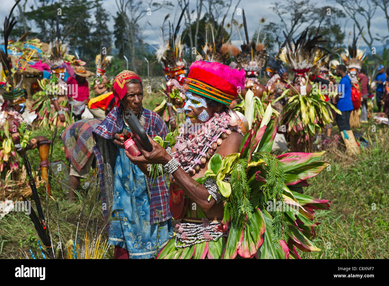 Tribal performers at Mt Hagen show in Papua New Guinea wearing bird of ...