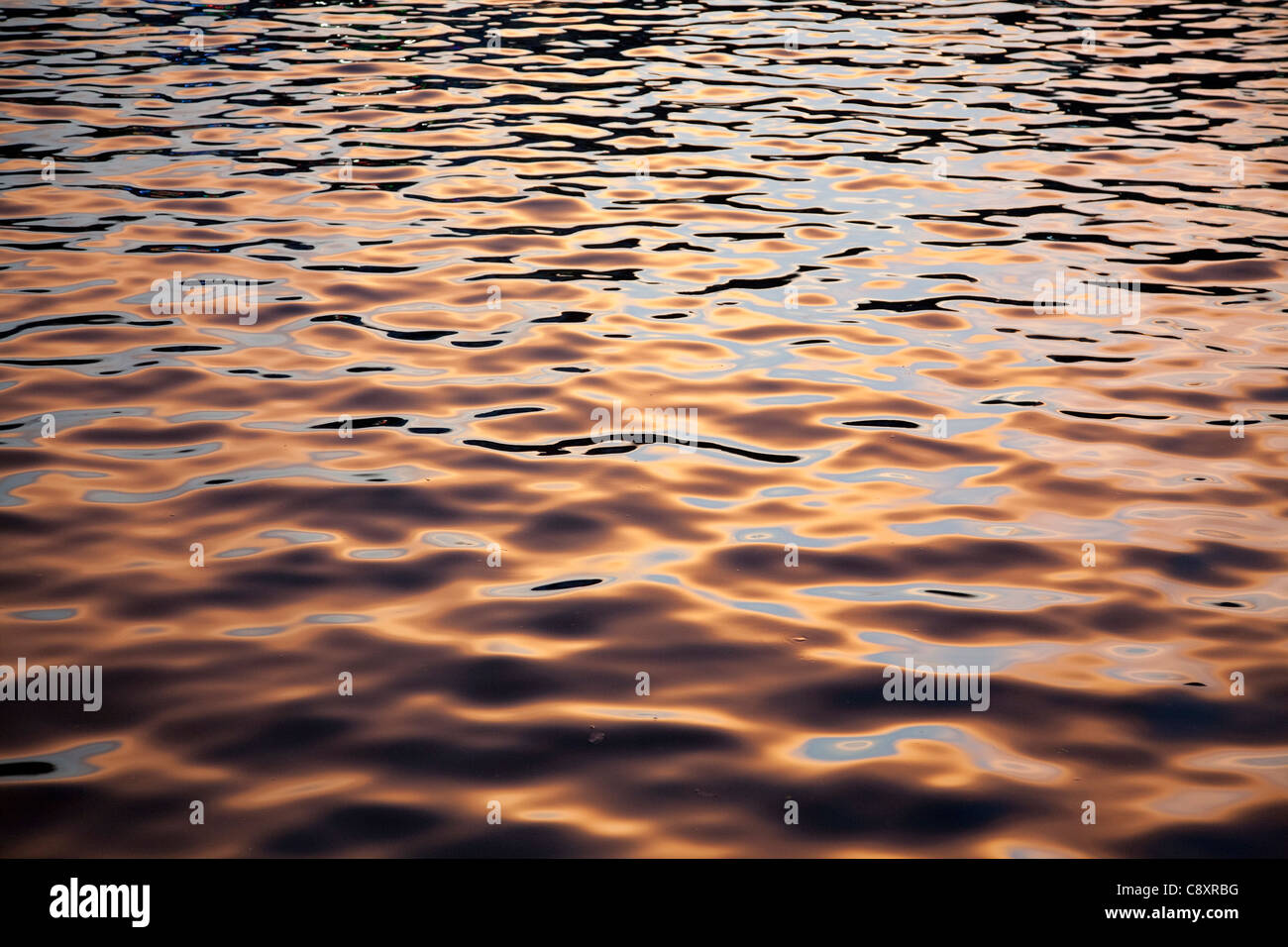 Sunset reflected on the water hi-res stock photography and images - Alamy