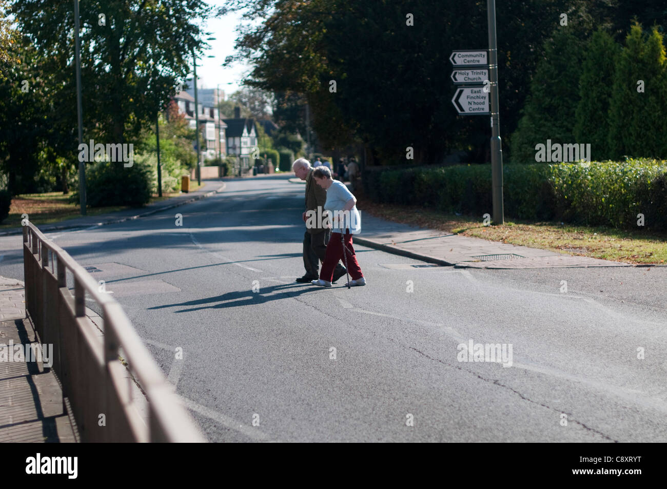 Elderly road crossing help hi-res stock photography and images - Alamy