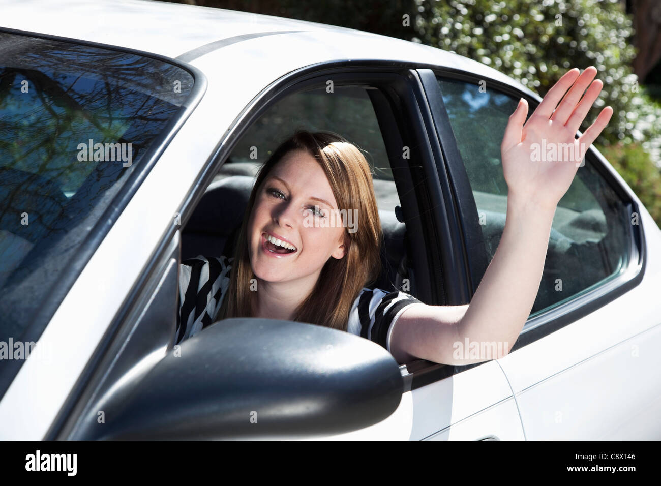 Person waving from car hi-res stock photography and images - Alamy