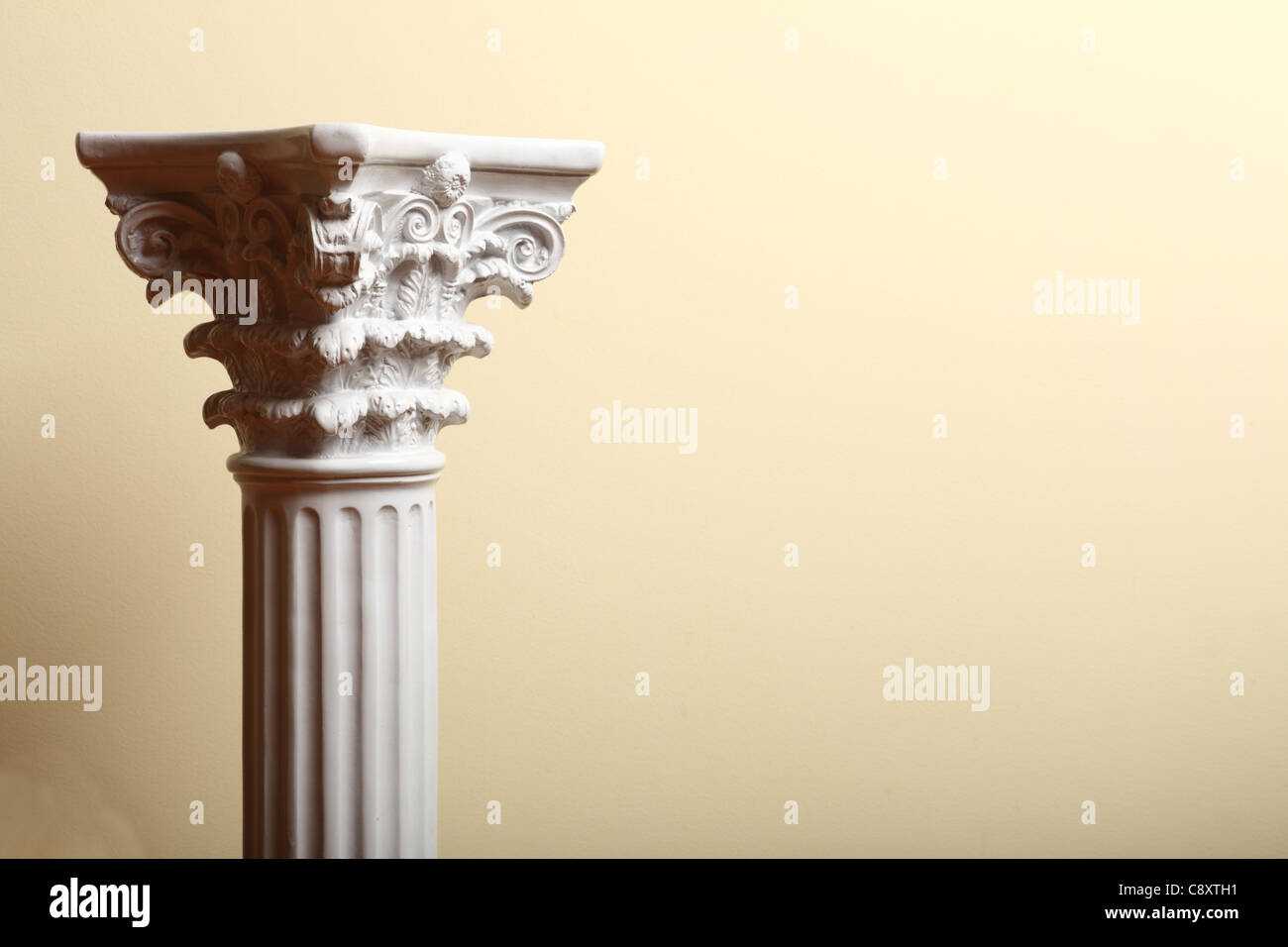 white column indoor on yellow background Stock Photo - Alamy