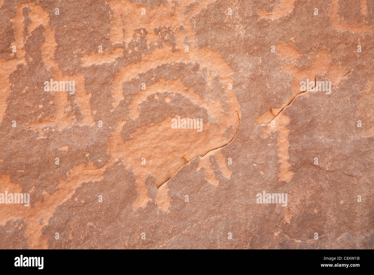 Ancient petroglyphs on a rock known as Graffiti Rock at Musayqirah ...
