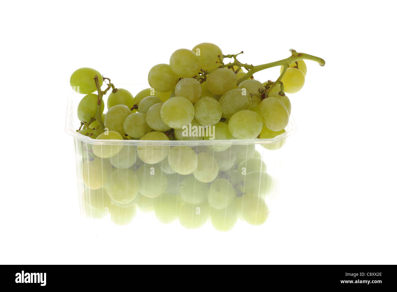 White grape cluster in box, isolated on white Stock Photo - Alamy