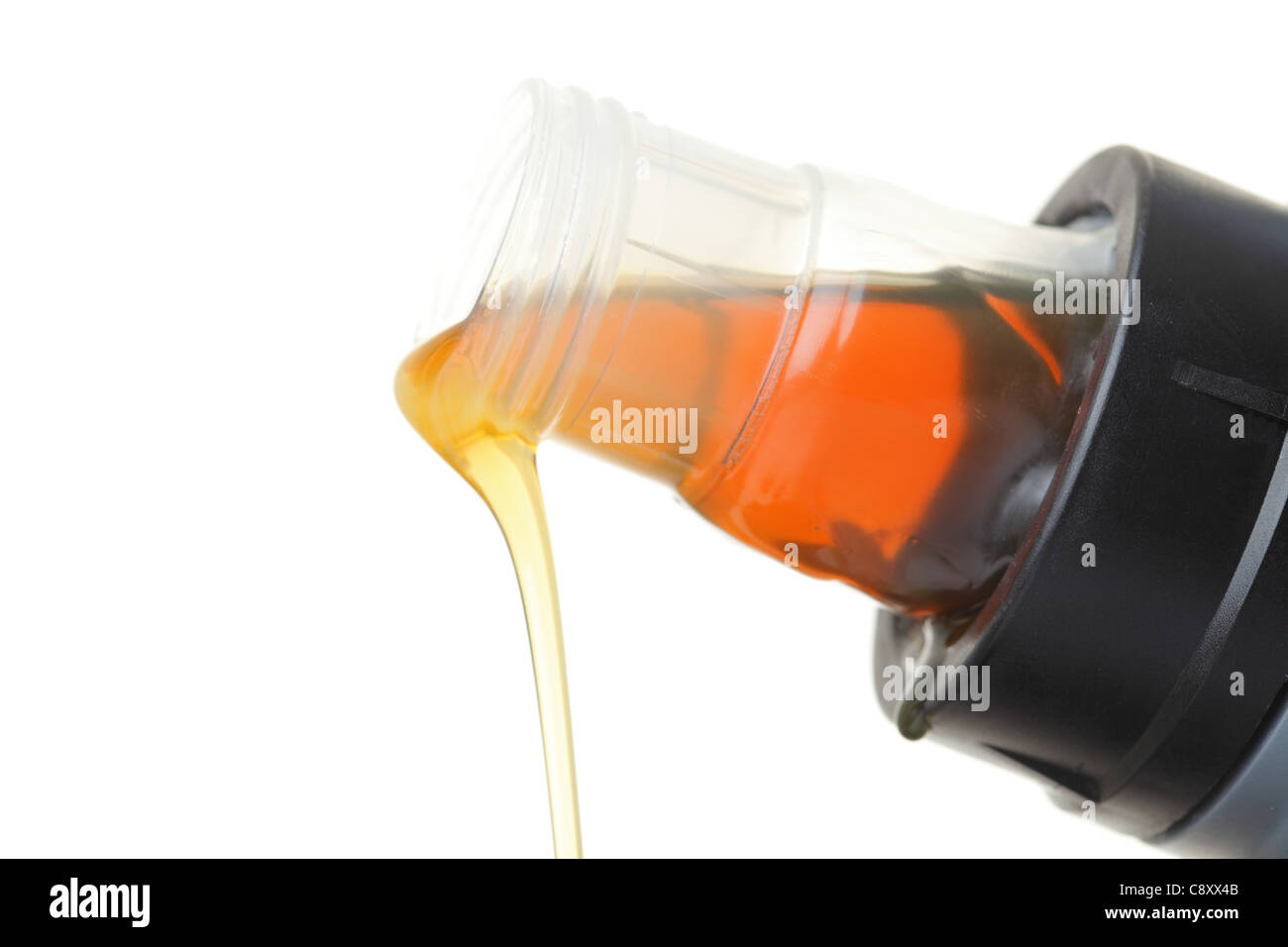 Can with car engine oil isolated on white Stock Photo - Alamy