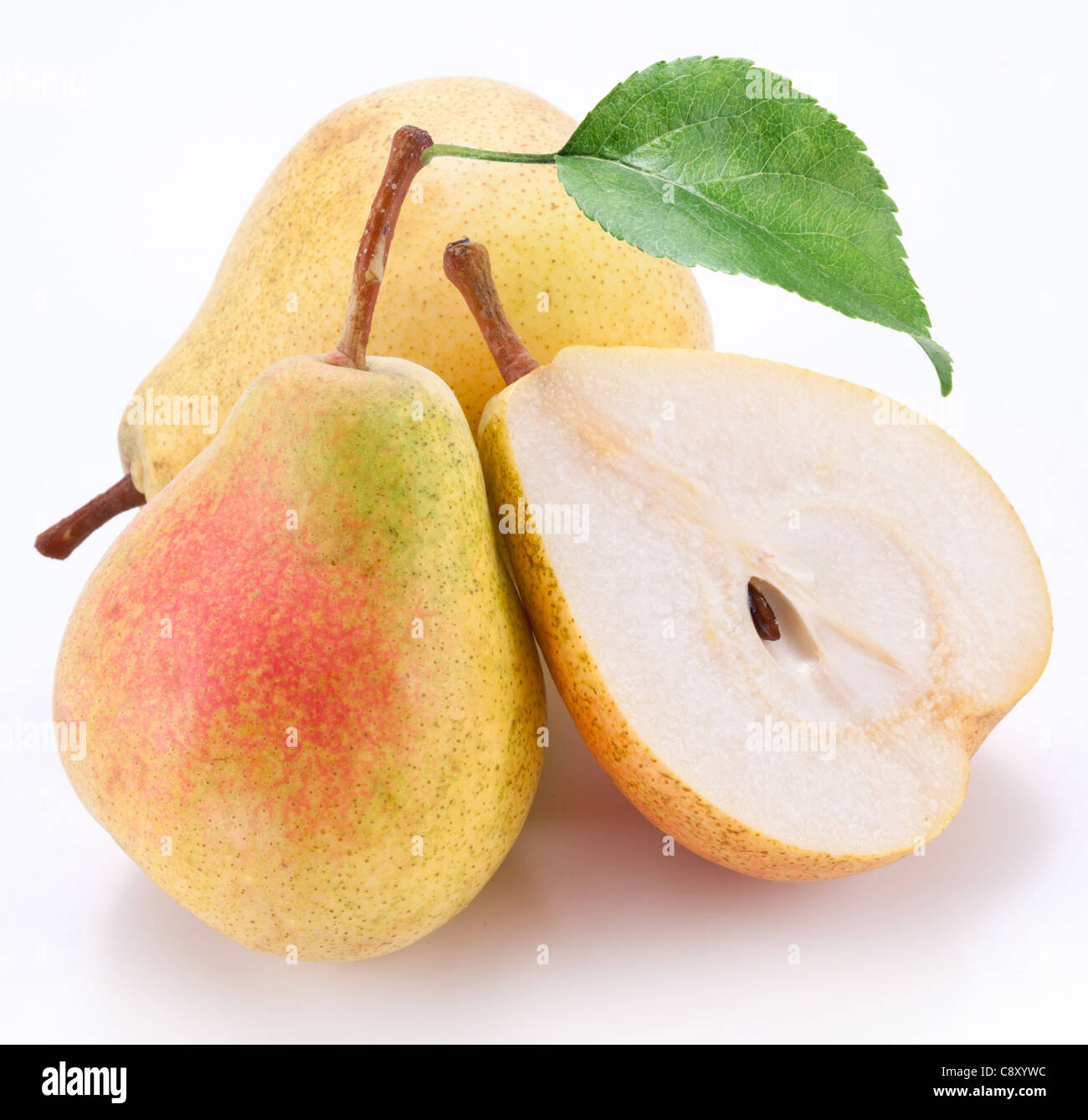 Pears with slice on a white background Stock Photo - Alamy