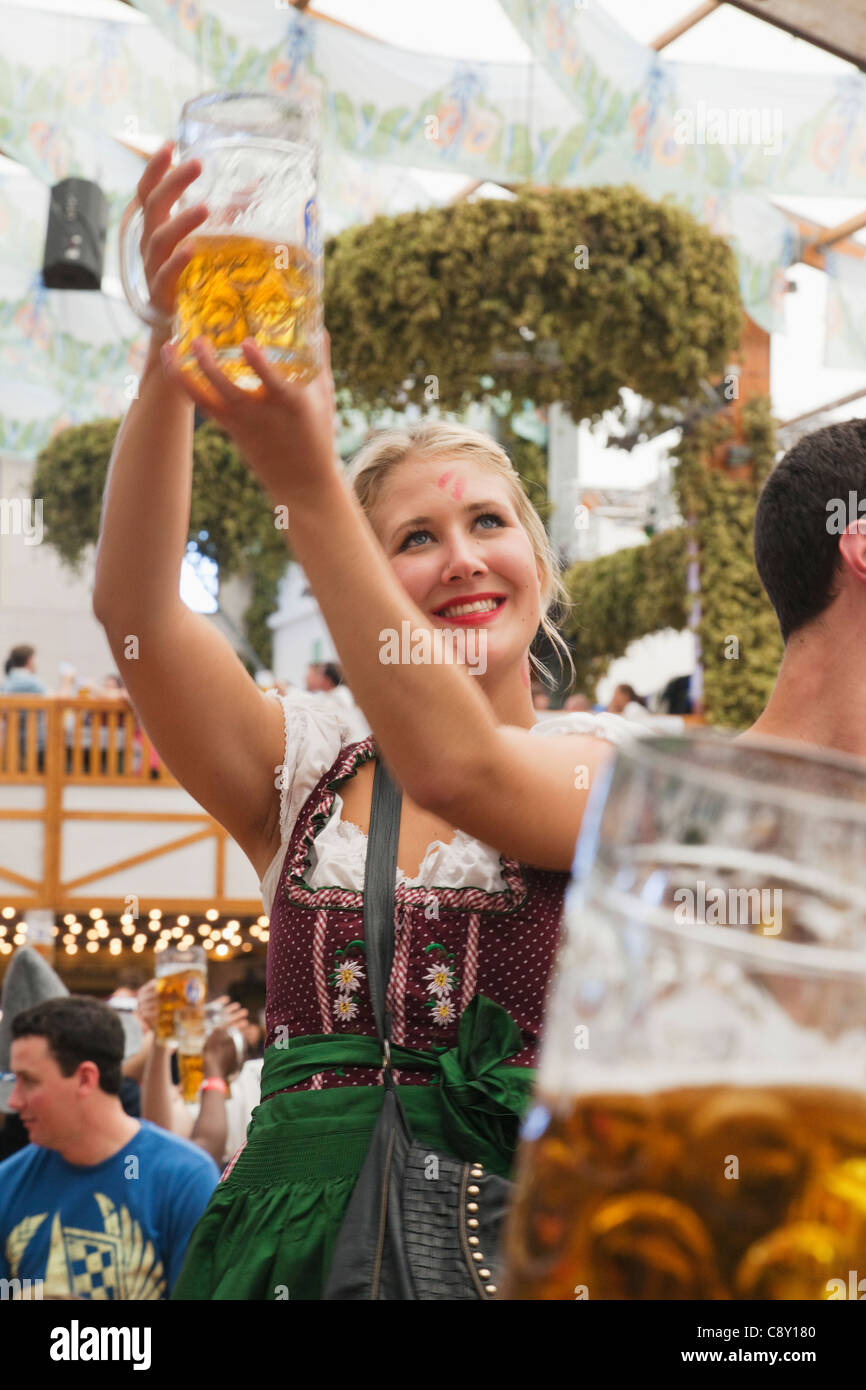 Germany, Bavaria, Munich, Oktoberfest, Girl Partying in Beer Tent Stock ...