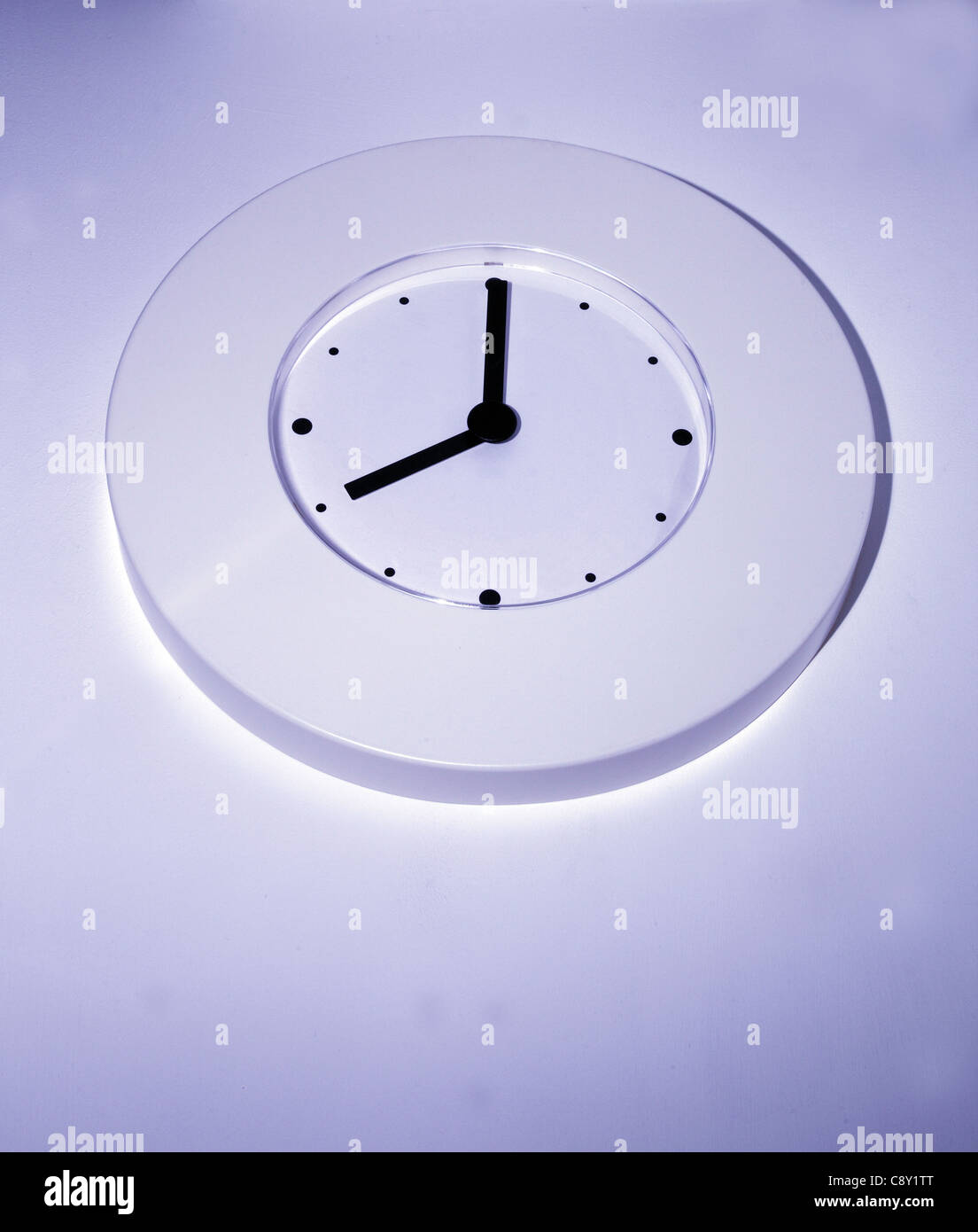 Wall clock set to 8 o'clock Stock Photo - Alamy