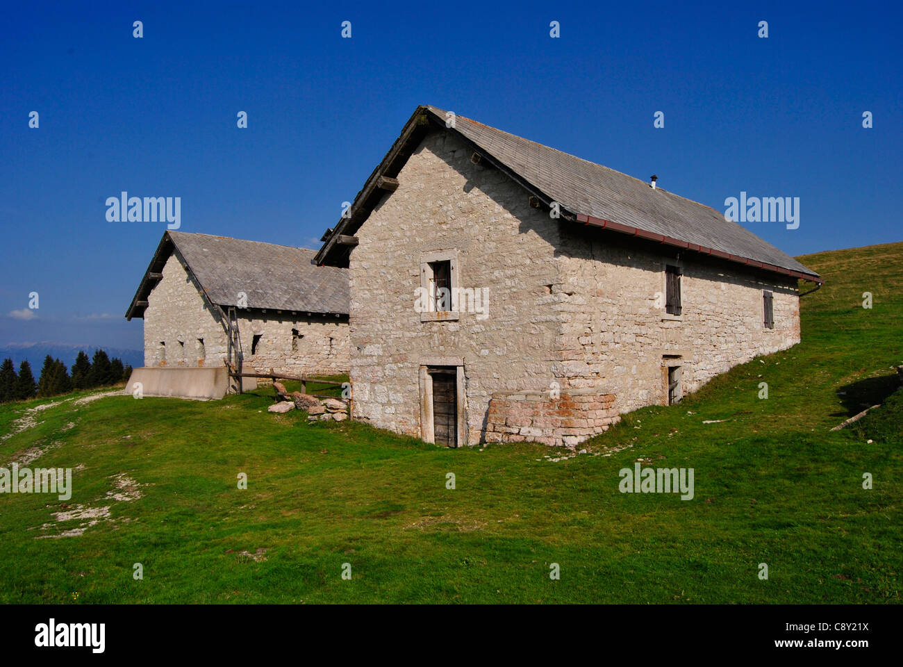 Typical Northern Italian Alps houses called Baita, made of wood and ...