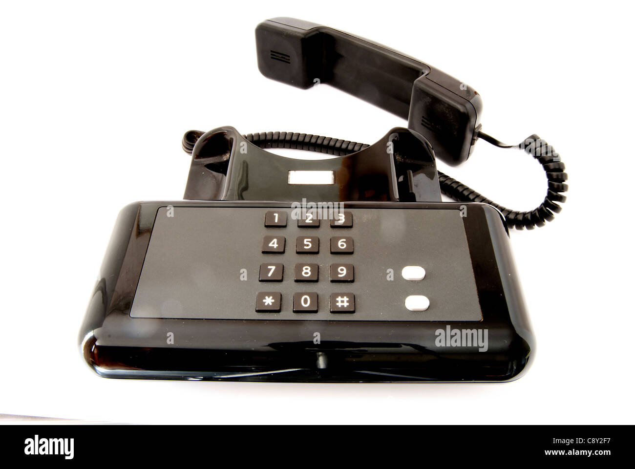 One black telephone isolated Stock Photo - Alamy