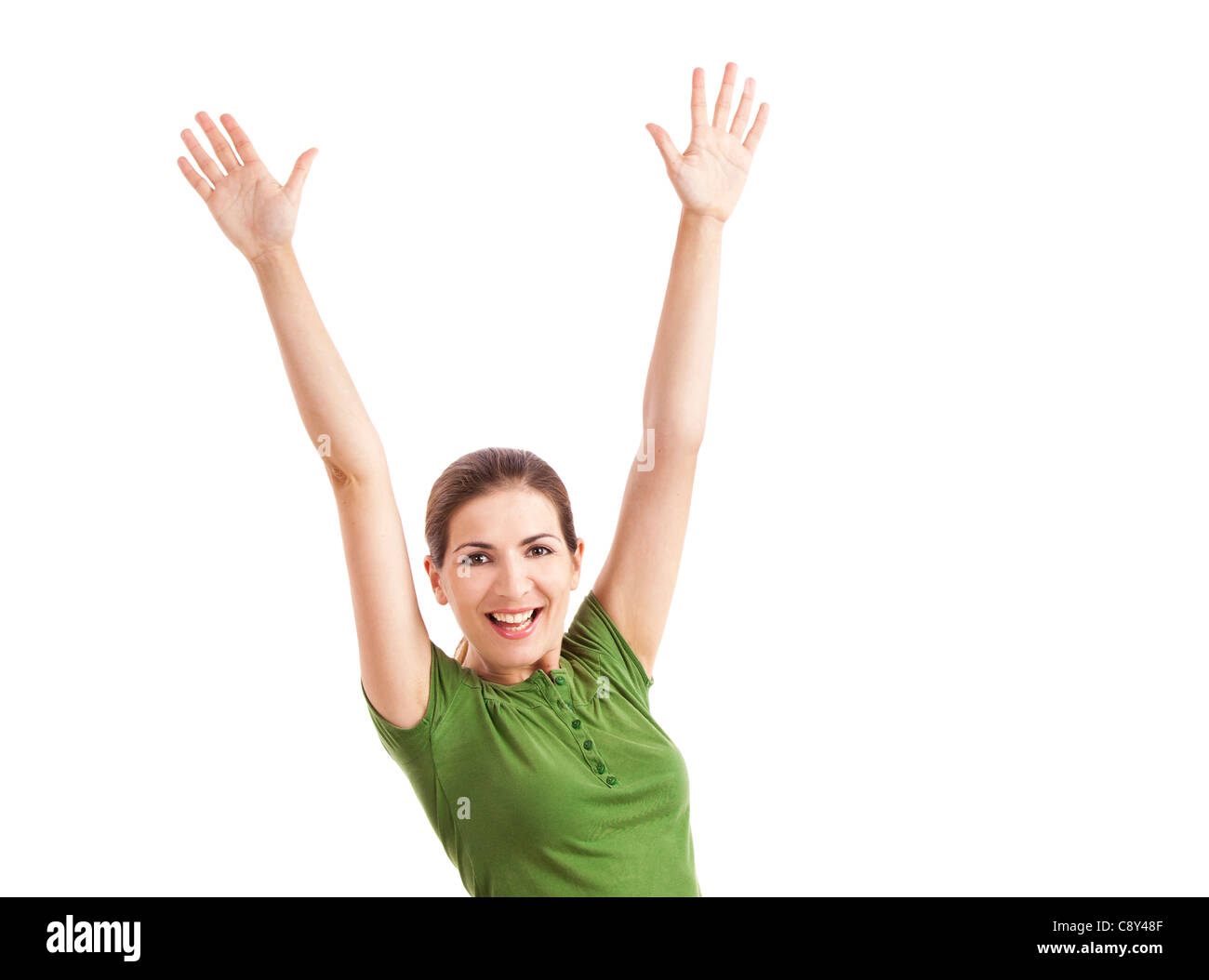 Happy young woman with arms up, isolated against a white background ...