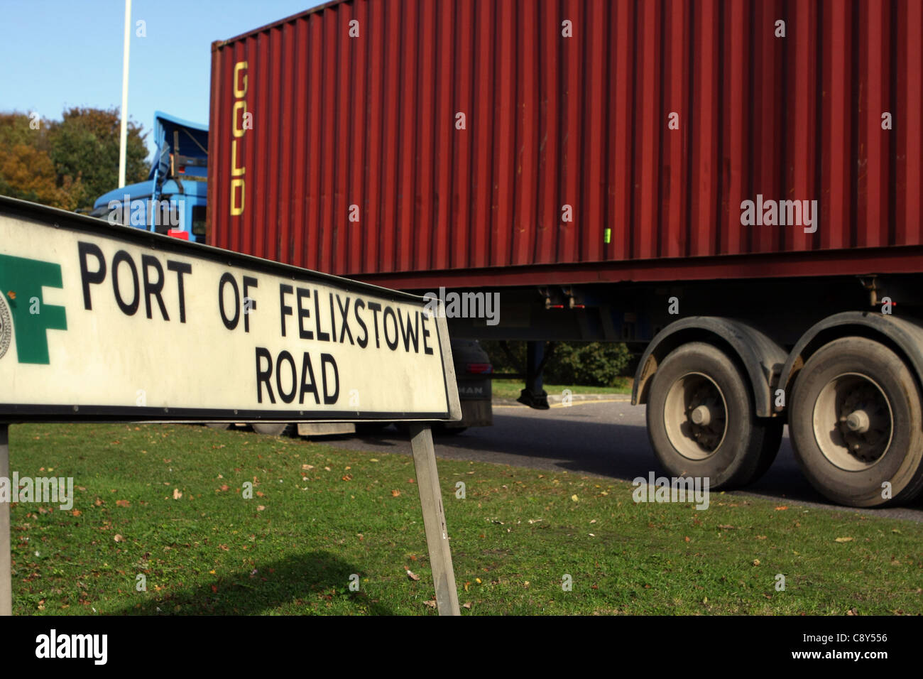Container truck passing a 'Port of Felixstowe Road' road sign Stock ...