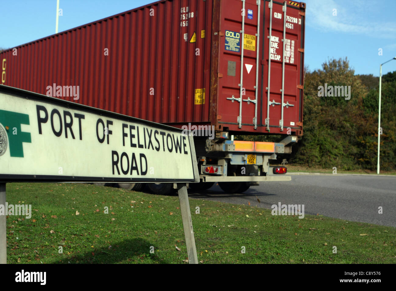 Container truck passing a 'Port of Felixstowe Road' road sign Stock ...