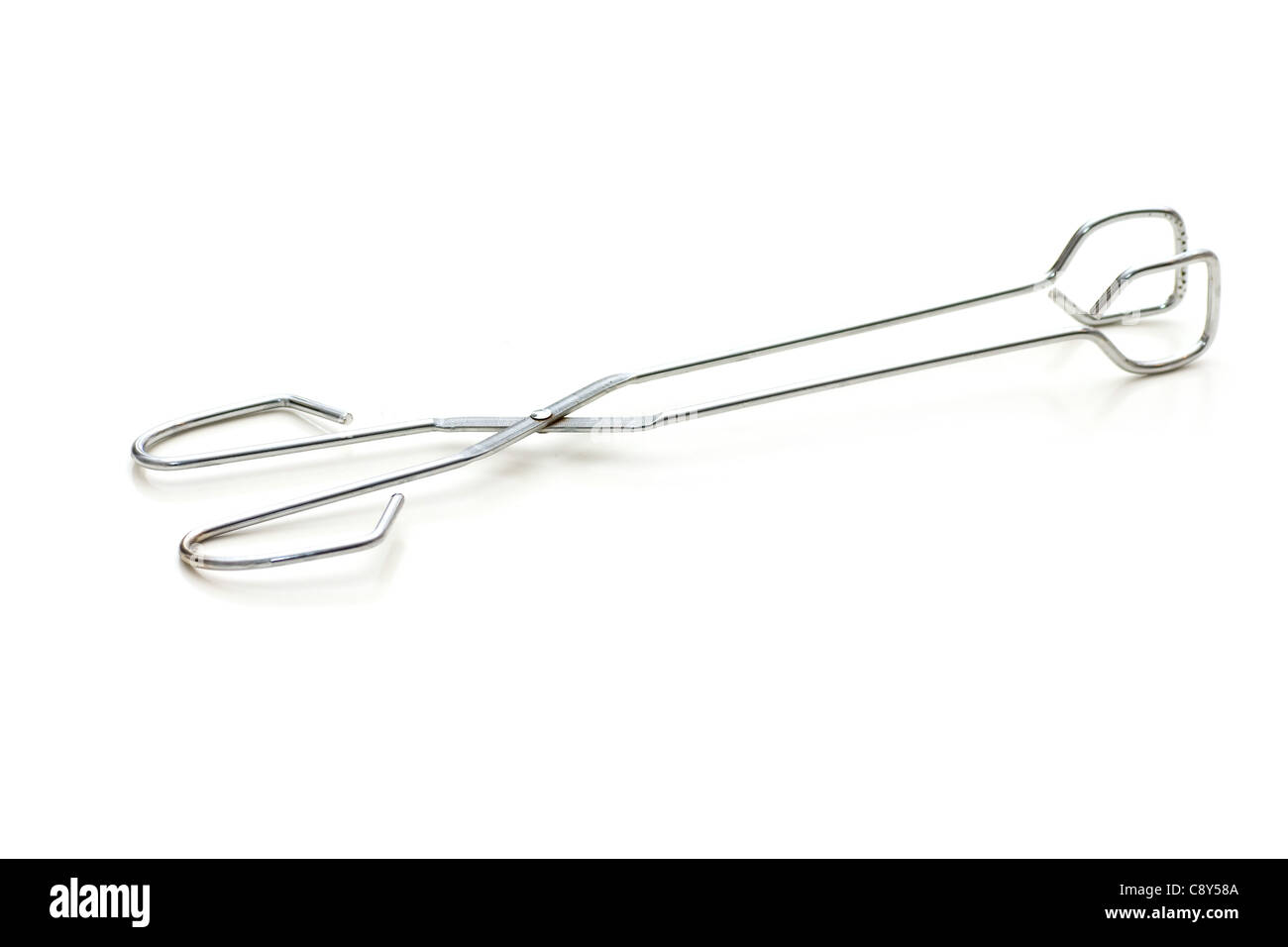 Grill tongs Cut Out Stock Images & Pictures - Alamy