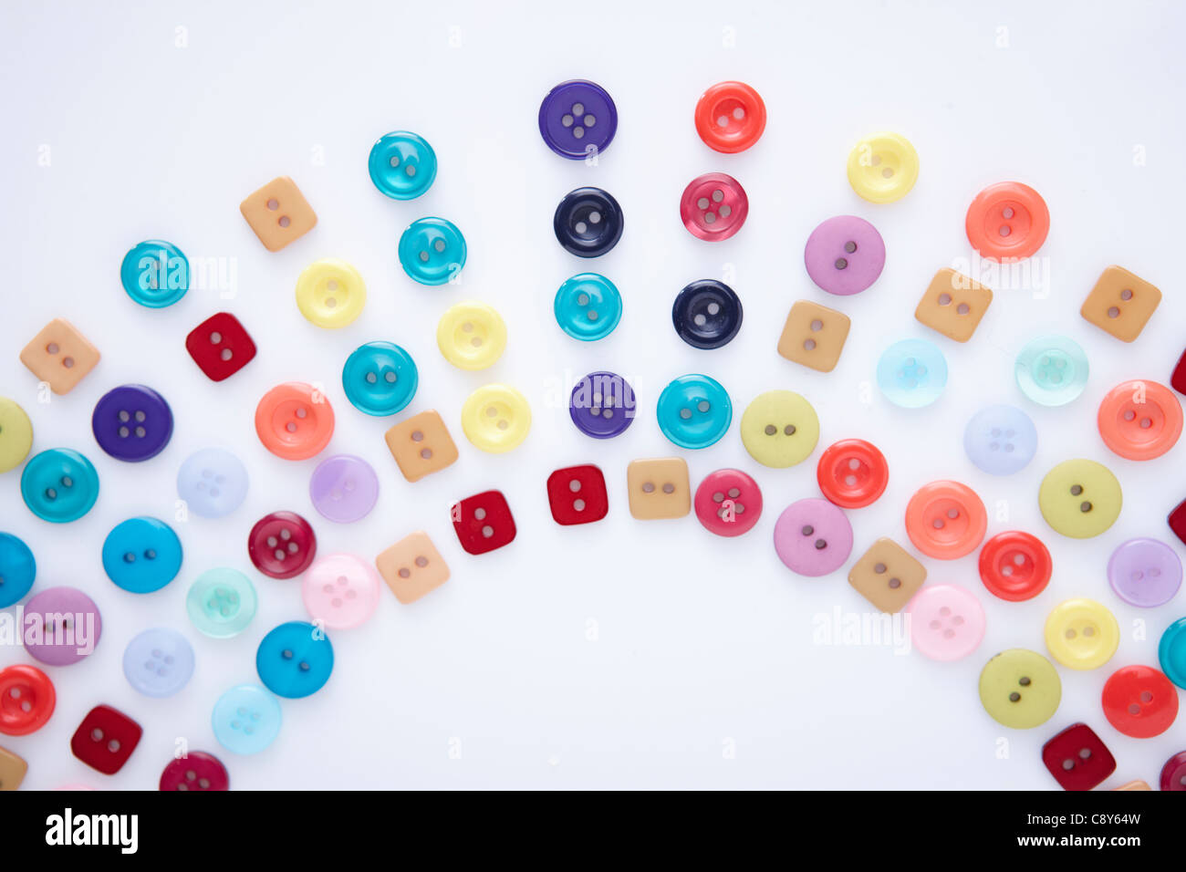 Various Sizes And Shapes Of Colorful Buttons In Fan Shape Stock Photo ...