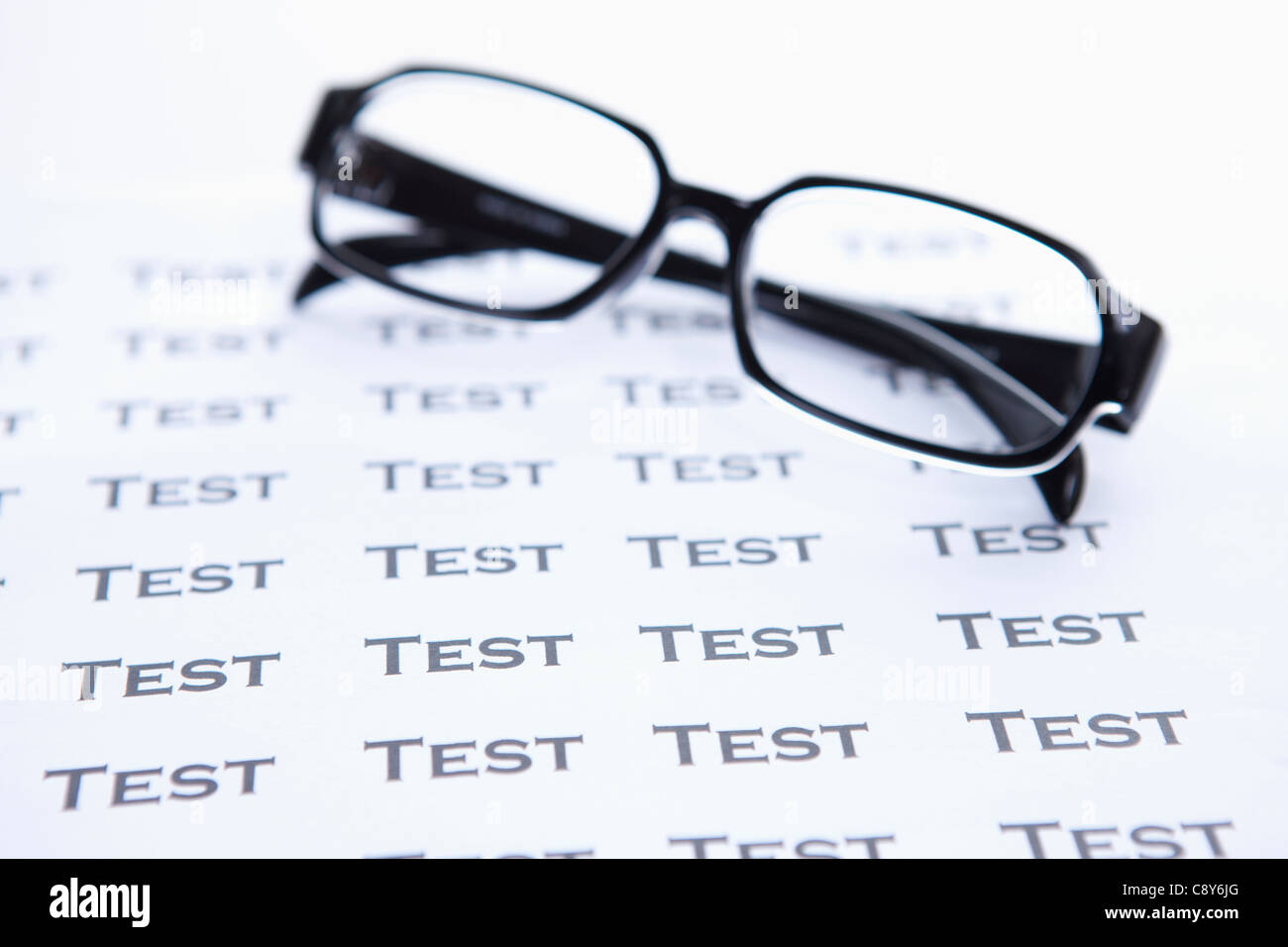 Tests Written Paper And Glasses On Top Stock Photo - Alamy