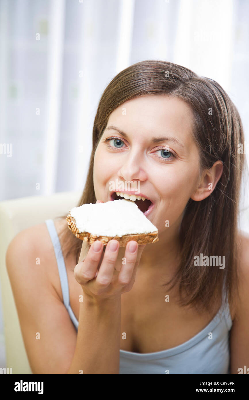 Person eating bread butter hi-res stock photography and images - Alamy