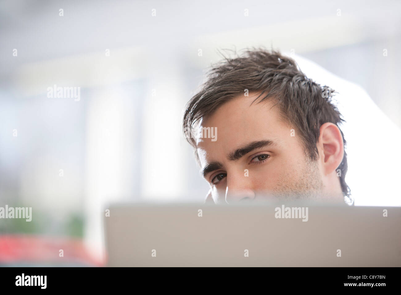 Businessman hiding behind computer monitor hi-res stock photography and ...