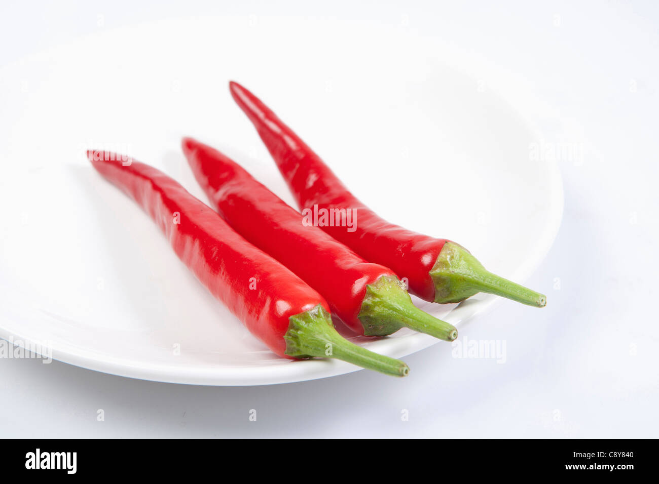 Three red chili pepper hi-res stock photography and images - Alamy
