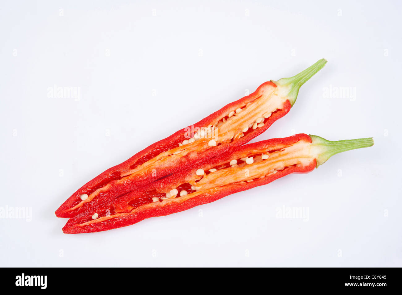 Red Pepper In Half Stock Photo - Alamy