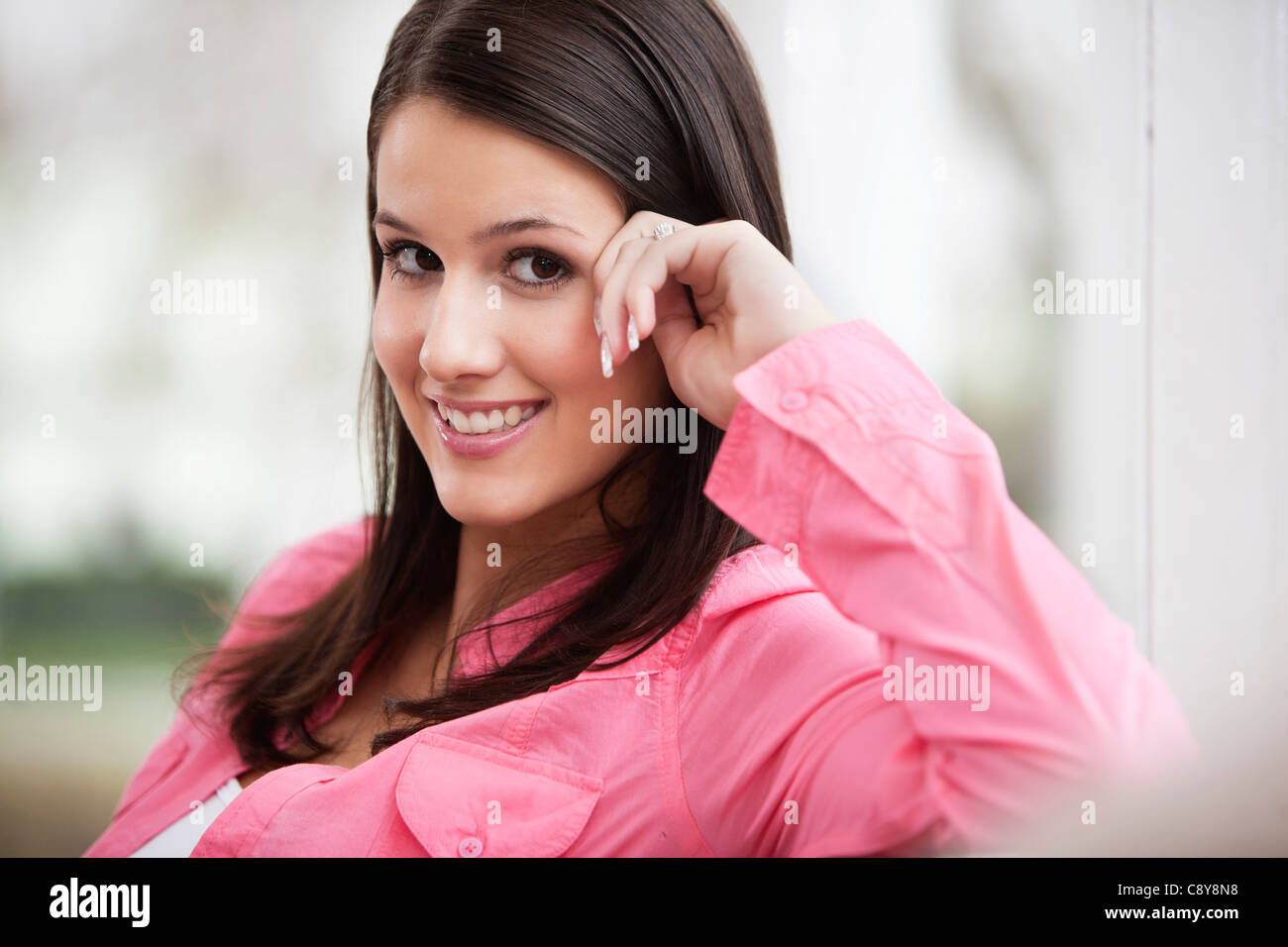 portrait of smiling young woman Stock Photo - Alamy