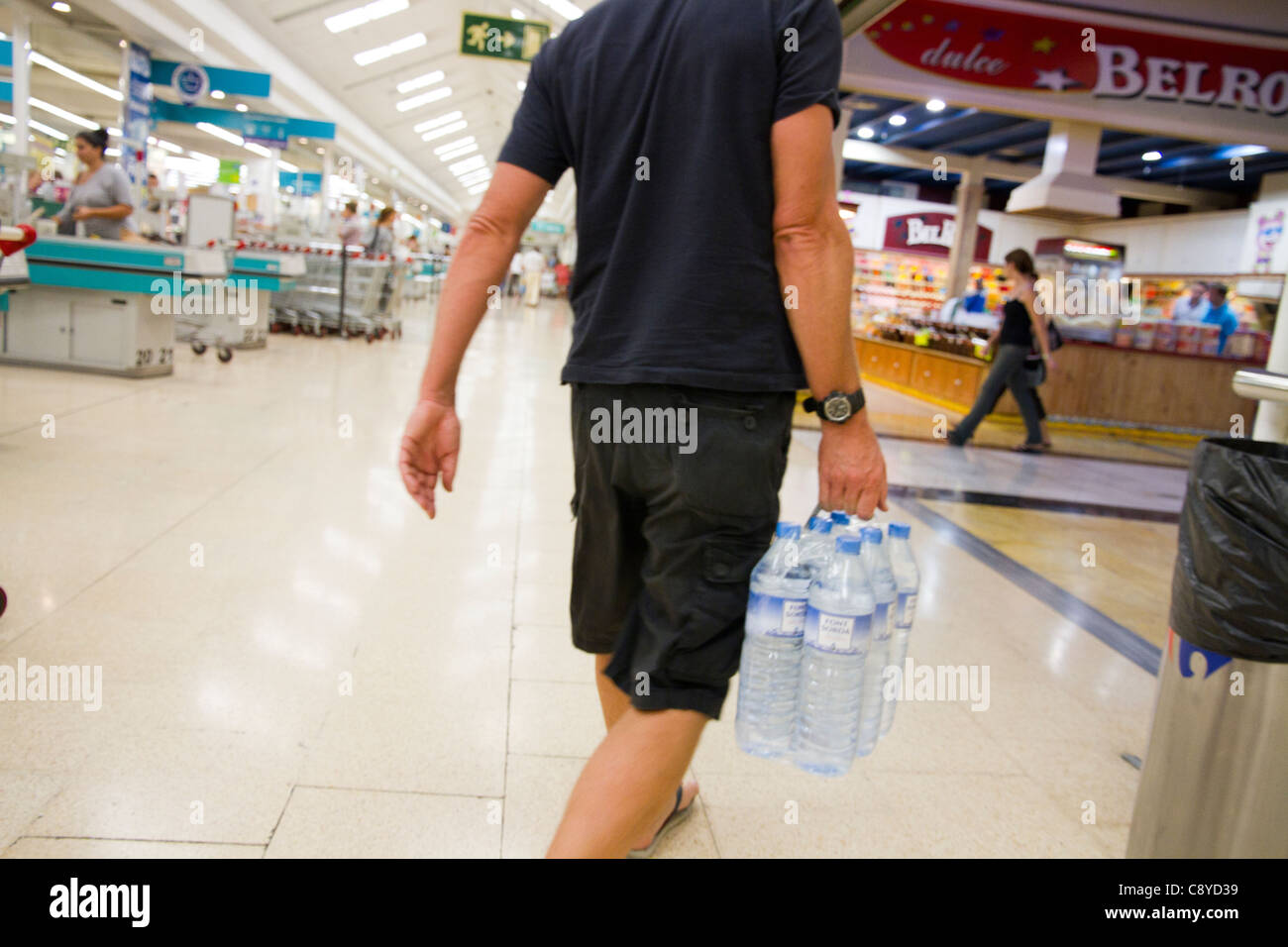 person man buying mineral water in Supermarket Mallorca Majorca Spain ...