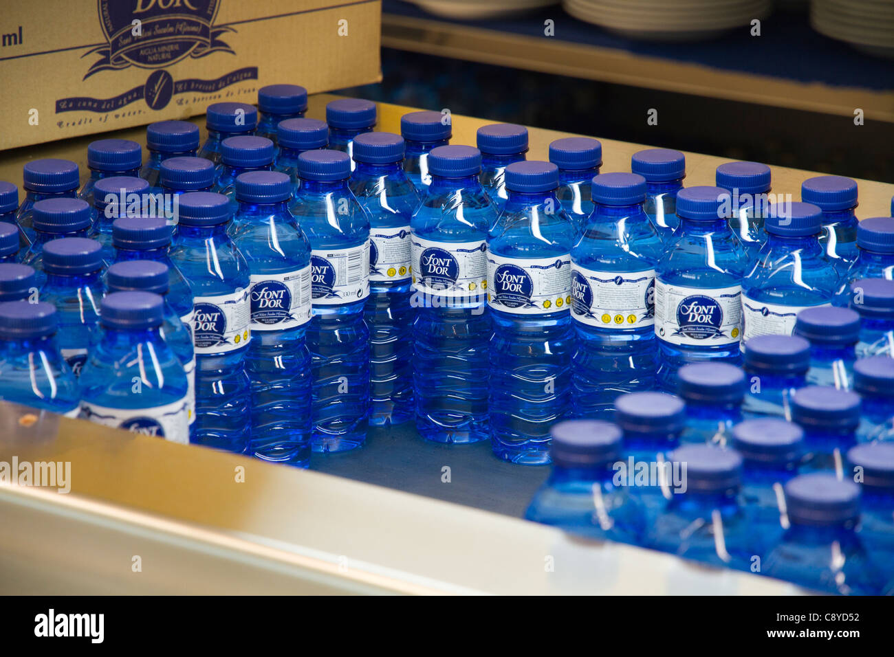 Plastic bottles of water in rows Stock Photo - Alamy