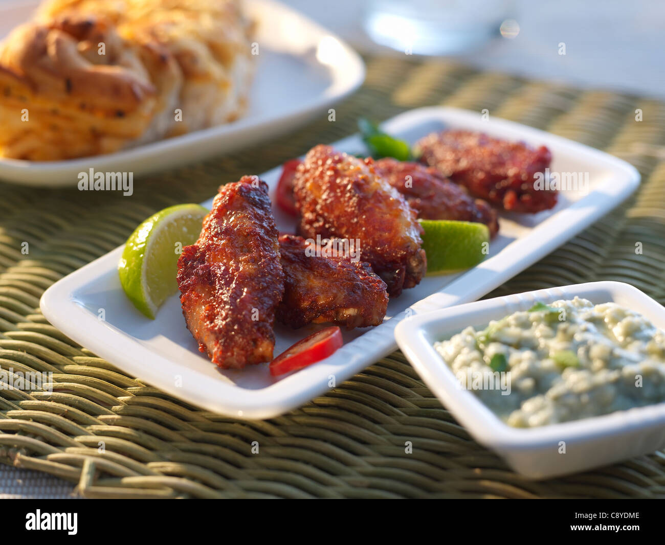spicy coated chicken wings Stock Photo - Alamy