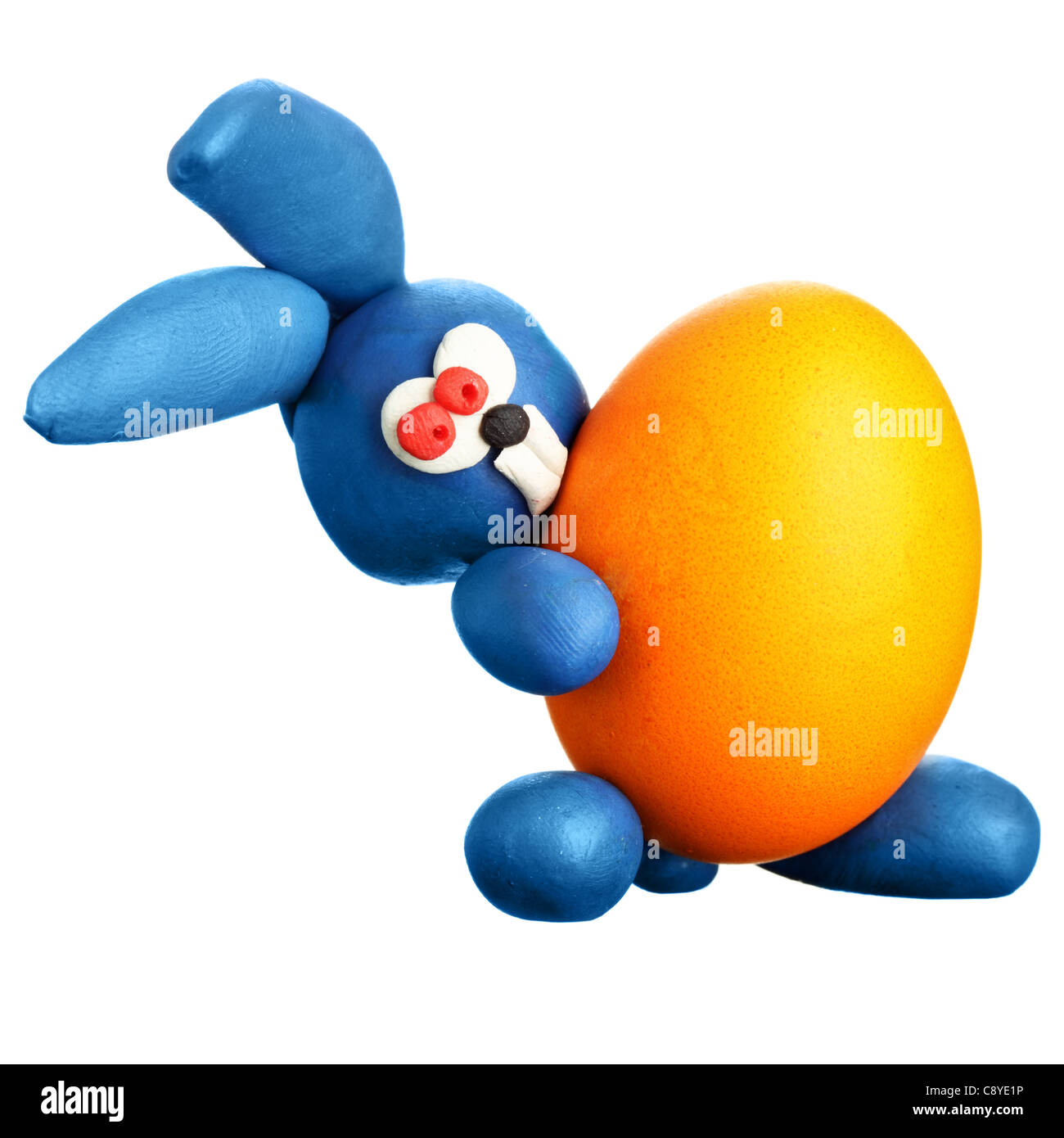 Plasticine rabbit with easter egg isolated over the white background ...