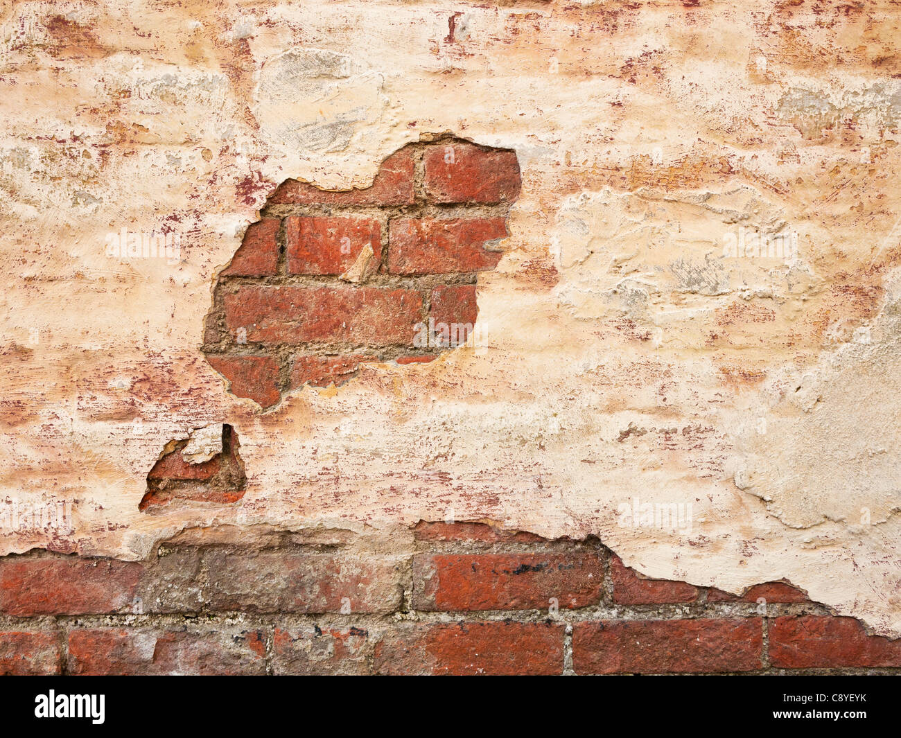 Distressed paintwork on exterior of brick building Stock Photo - Alamy