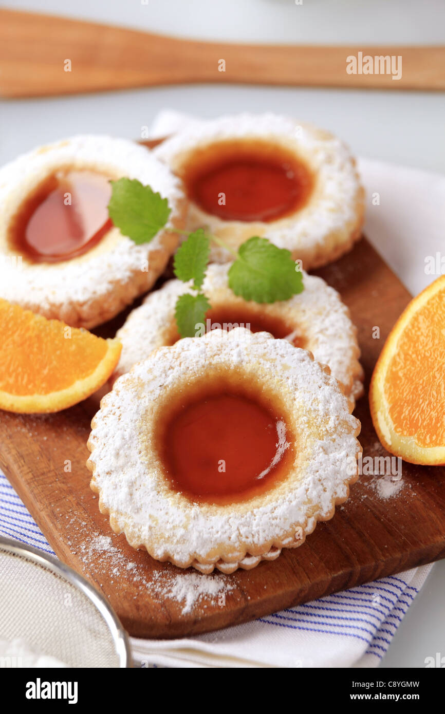 Jam biscuits sprinkled with icing sugar - still life Stock Photo - Alamy