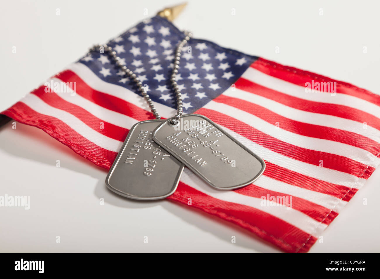Studio shot of American flag and dog tags Stock Photo - Alamy