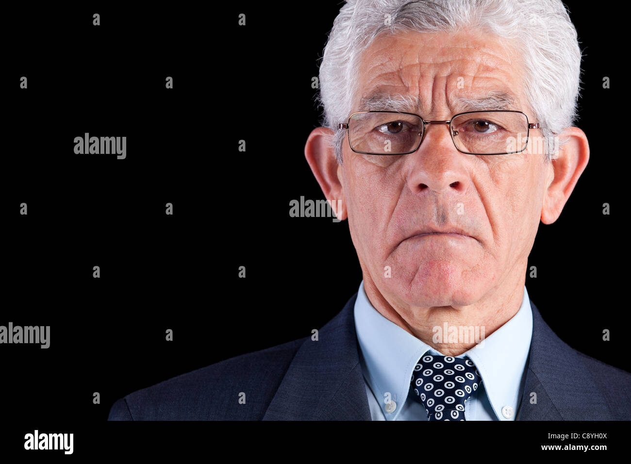 Powerful businessman portrait (isolated on black Stock Photo - Alamy