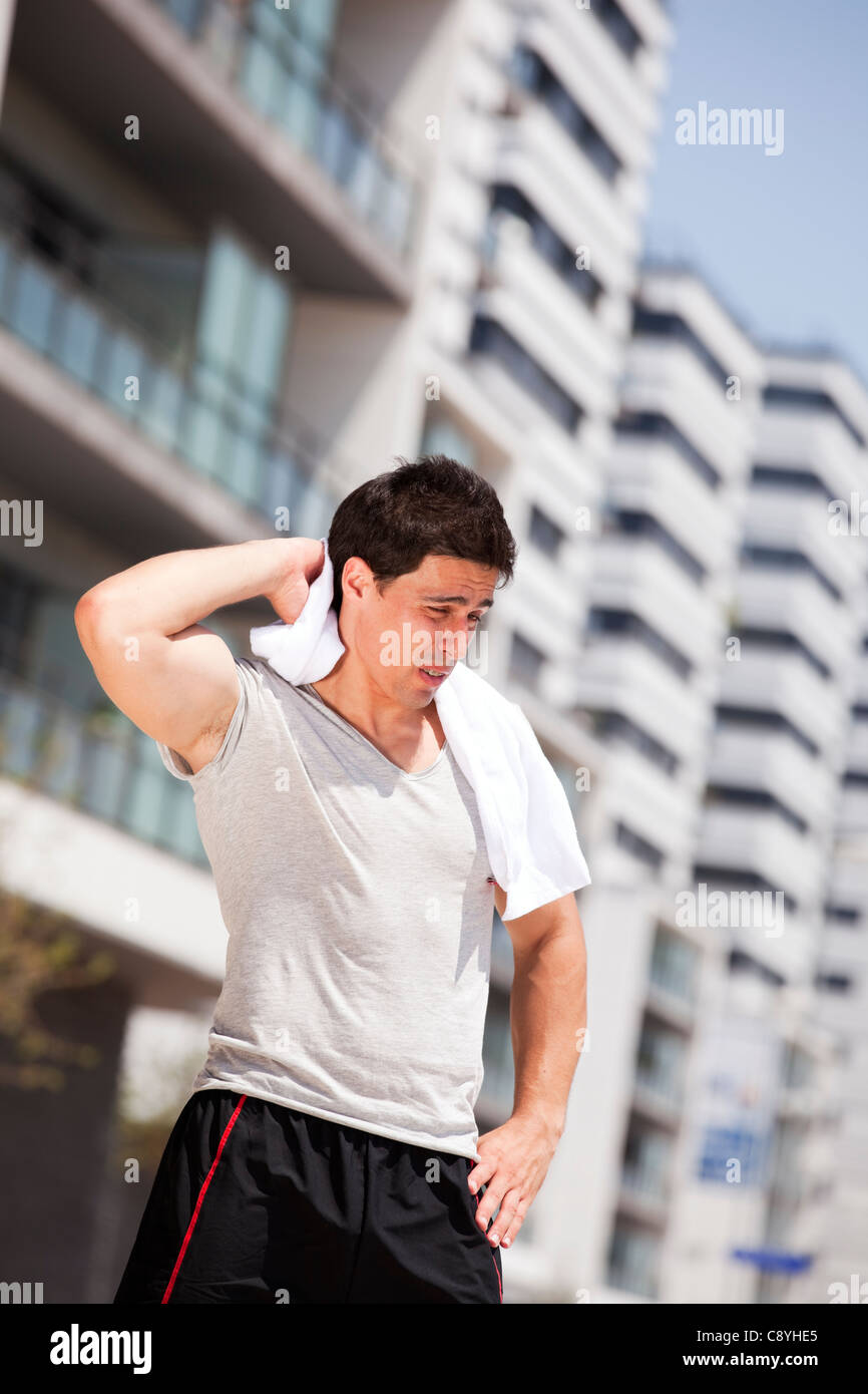 Athlete man tired after a long running sport event in the city Stock ...