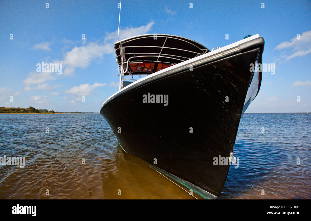 Close up view of the bow of a big black boat Stock Photo - Alamy
